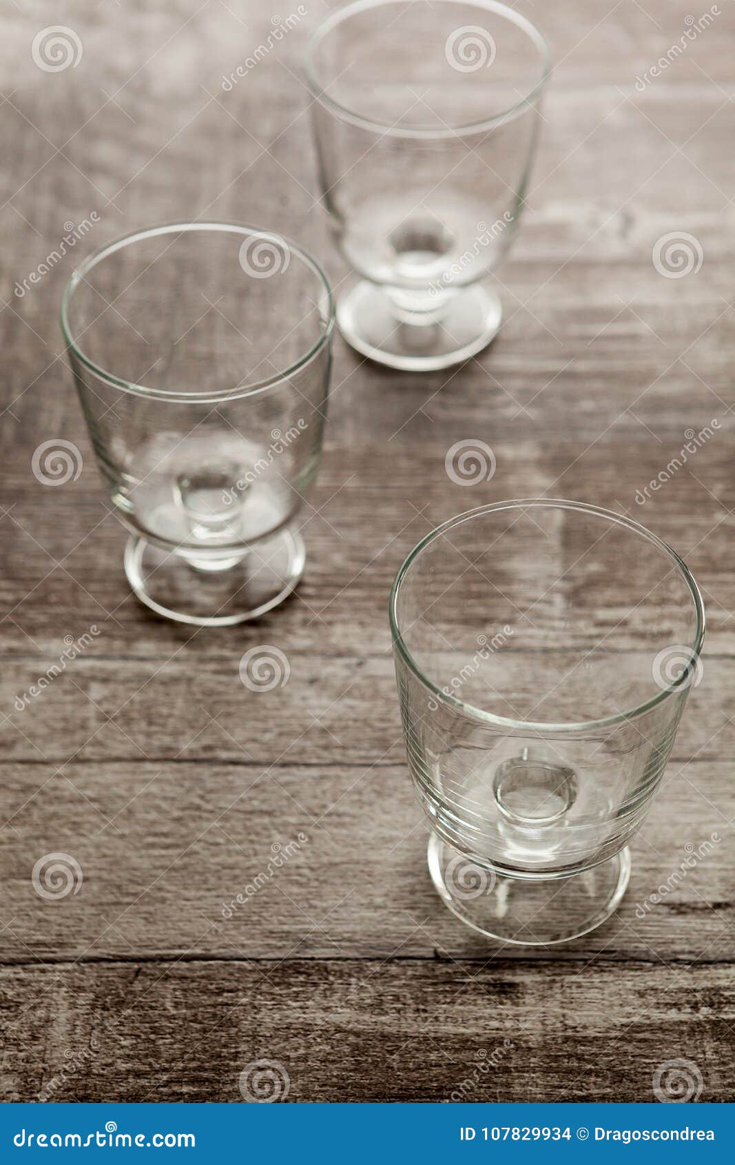 Three Empty Glasses Lying on Wooden Table Stock Photo - Image of three ...
