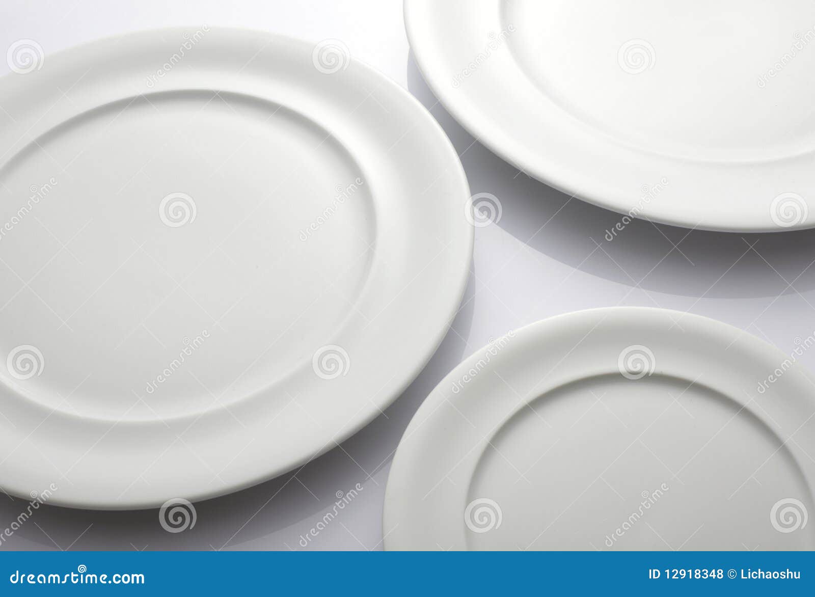 Three Empty white plates stock photo. Image of dish, lunch - 12918348