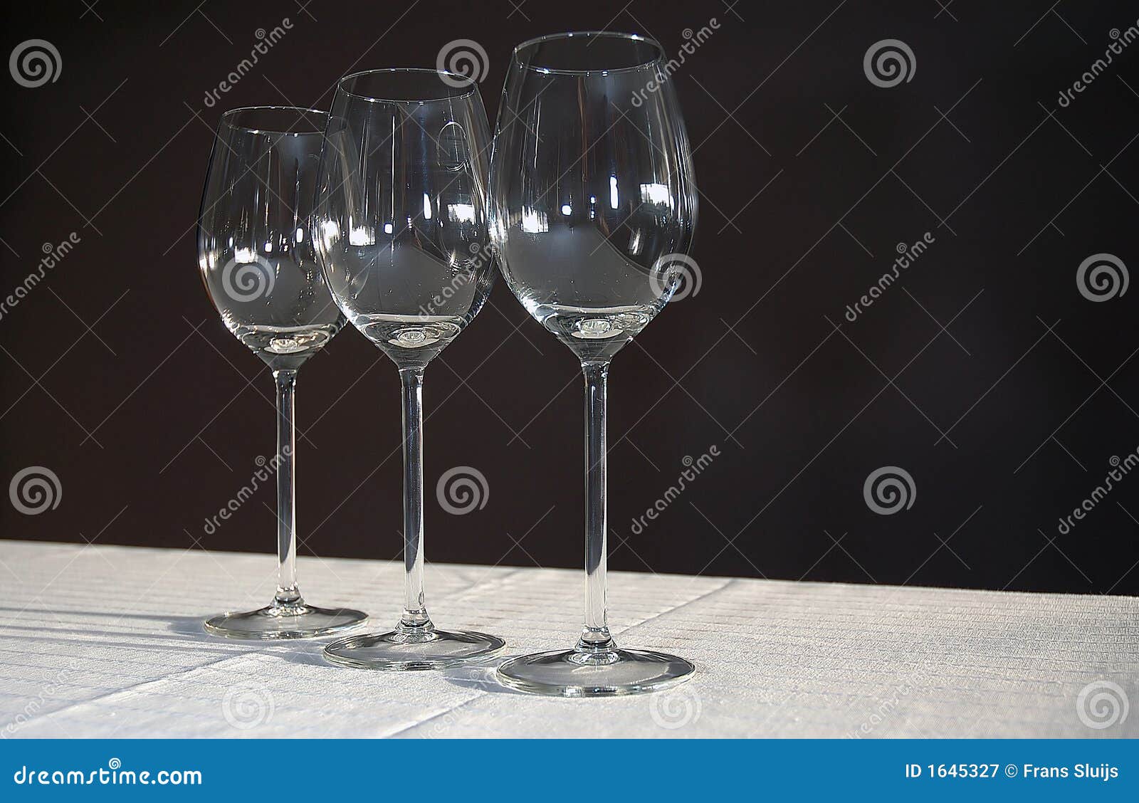 Three Empty Wine Glasses stock image. Image of tablecloth - 1645327