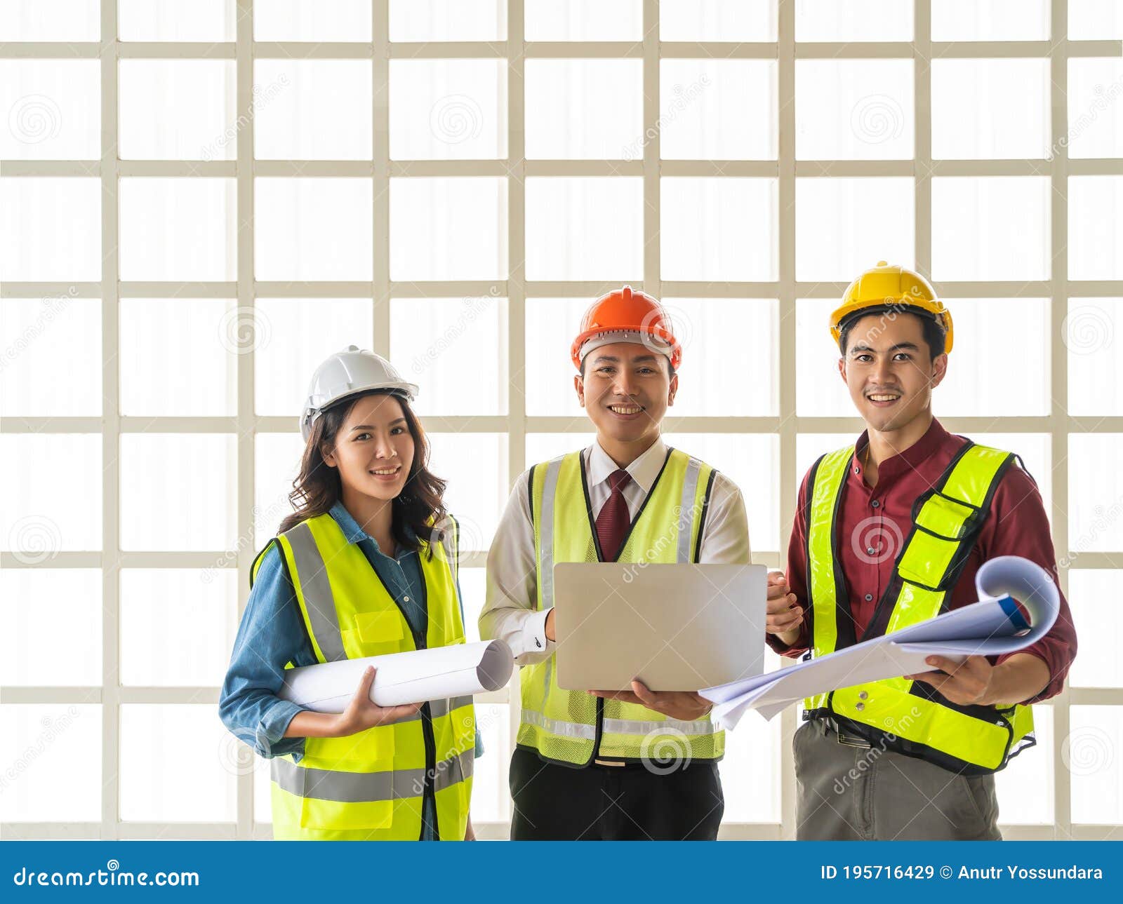 Engineer Male and Female Portrait with Blueprint and Computer on Bright ...