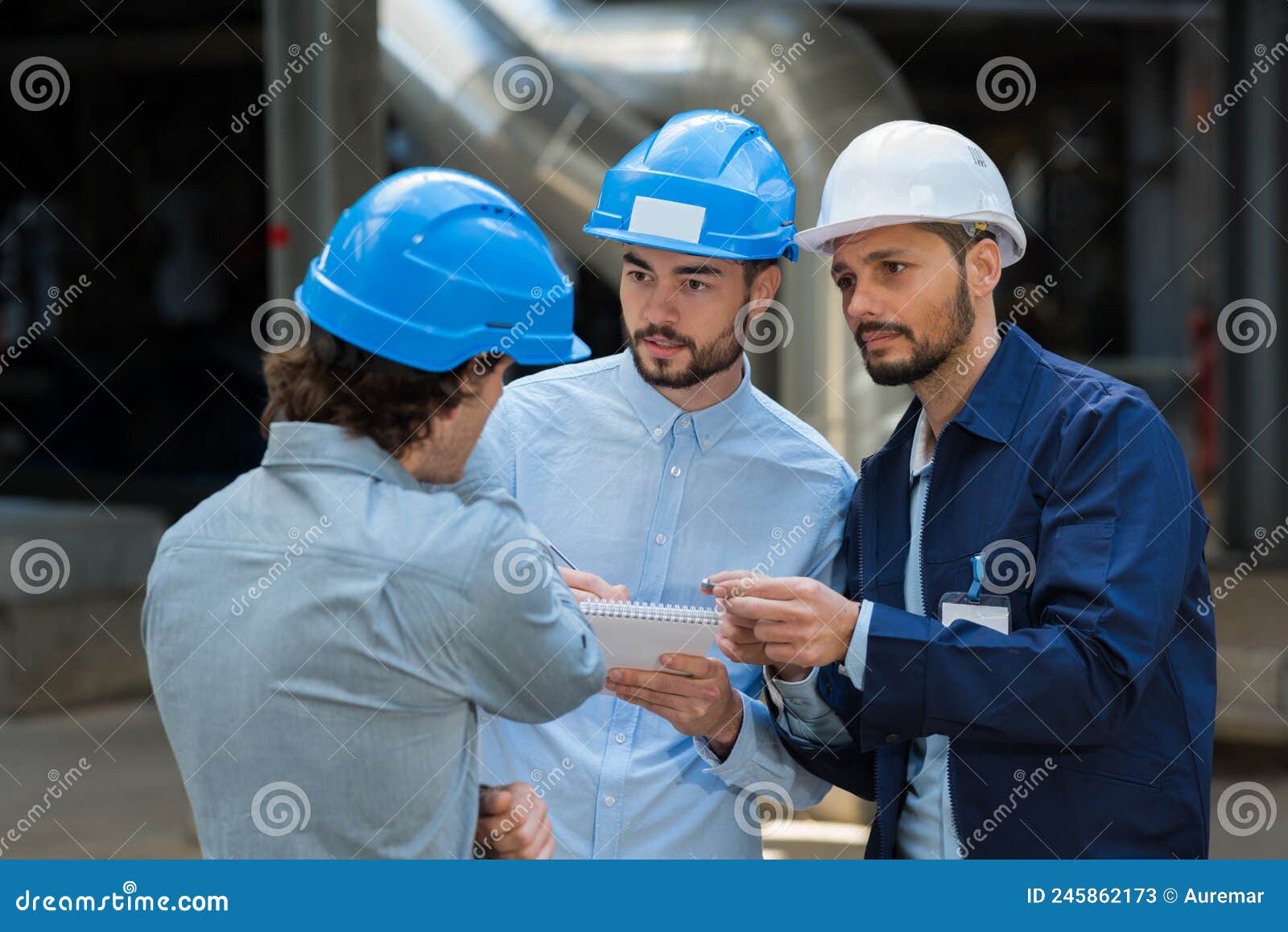 Three Engineer Talking about Work at Construction Site Stock Image ...