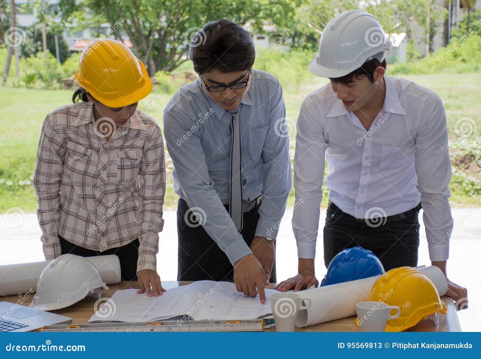 Three Engineer Teams I& X27;m Talking about Construction. Stock Image ...