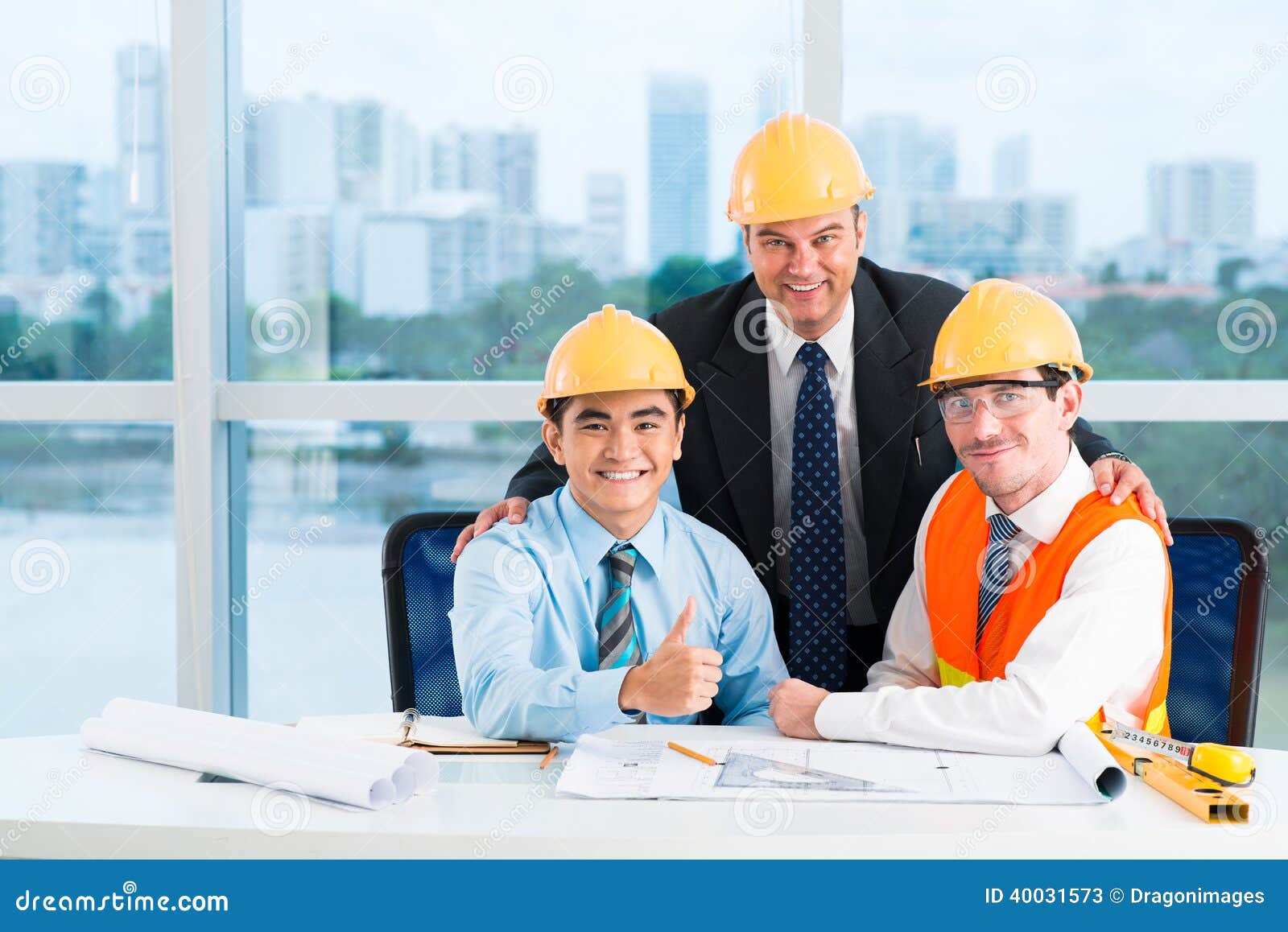 Three engineers stock image. Image of engineering, draft - 40031573