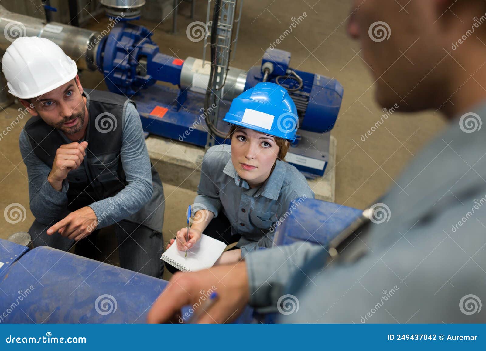 Three Engineers Working in Factory Stock Photo - Image of plan ...