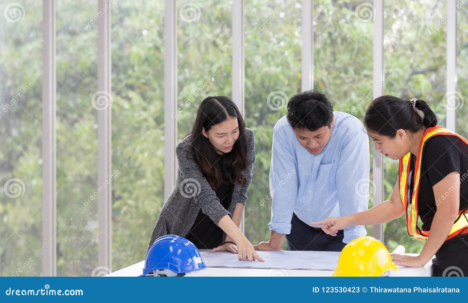 Three Engineers Working Meeting Room at the Office. Three Worker Stock ...
