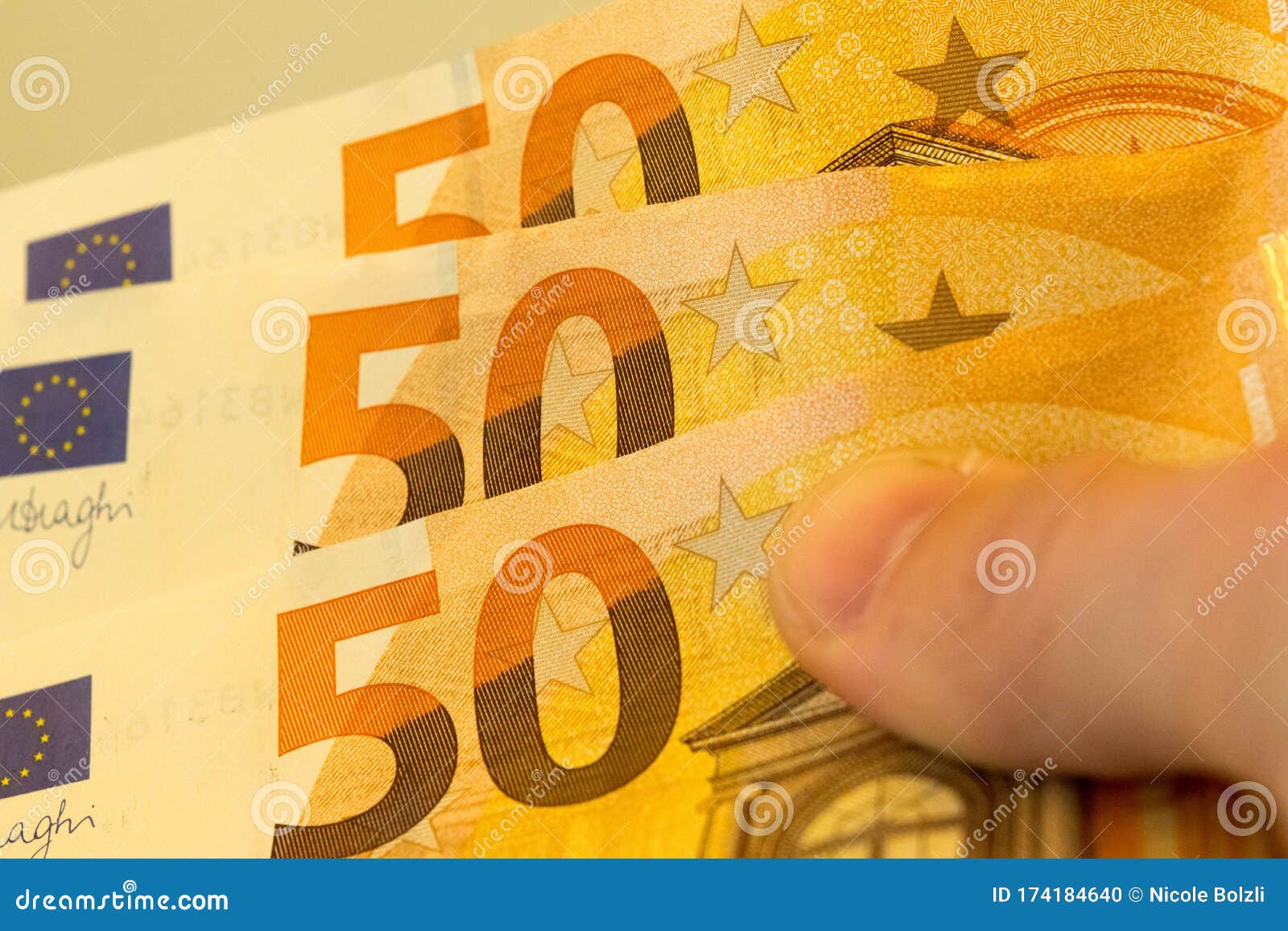 Three 50 Euro Bills in a Hand. 150 Euro Stock Photo - Image of bended ...