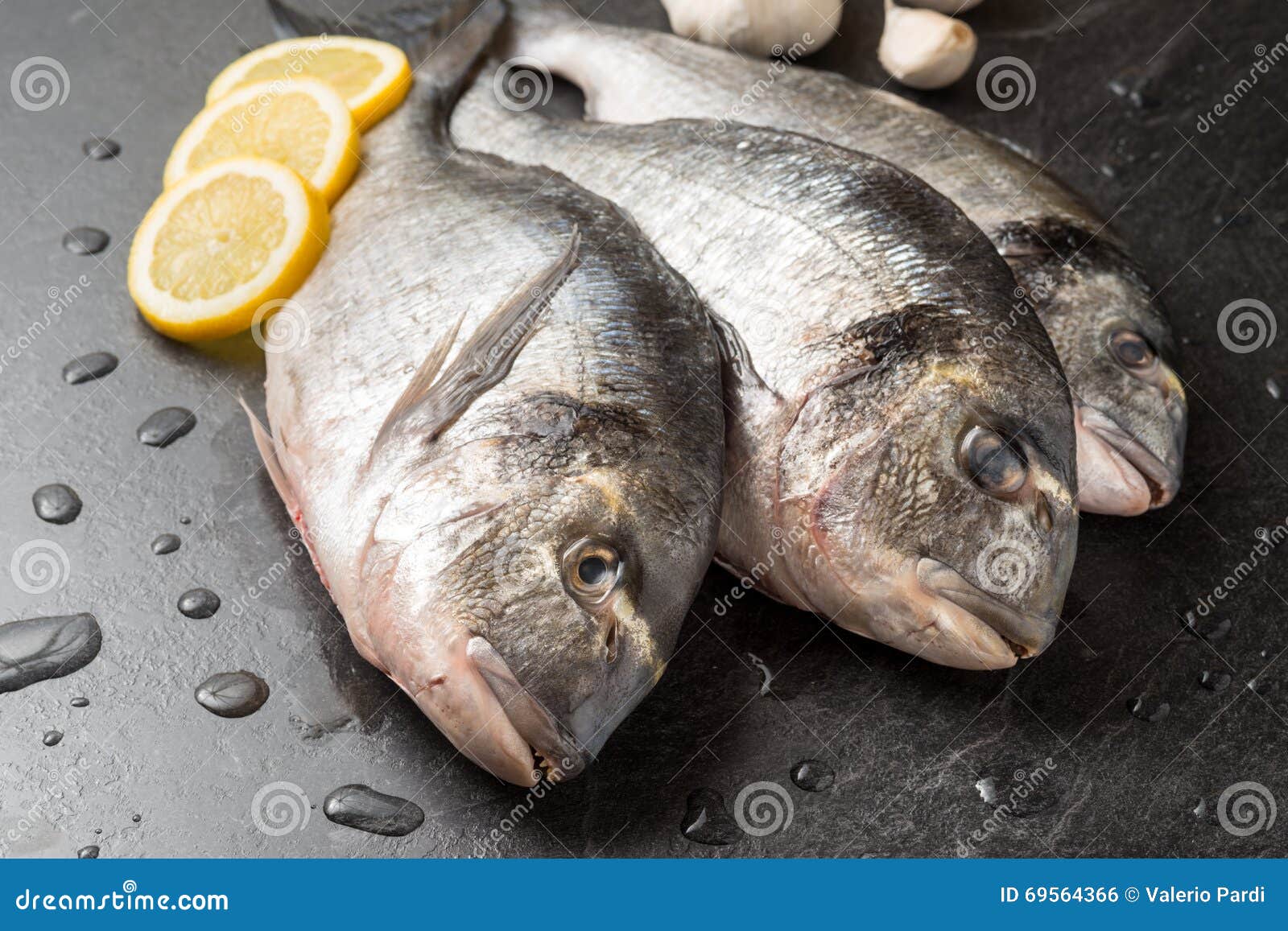 Three Eviscerated Sea Bream Stock Photo - Image of cuisine, head: 69564366