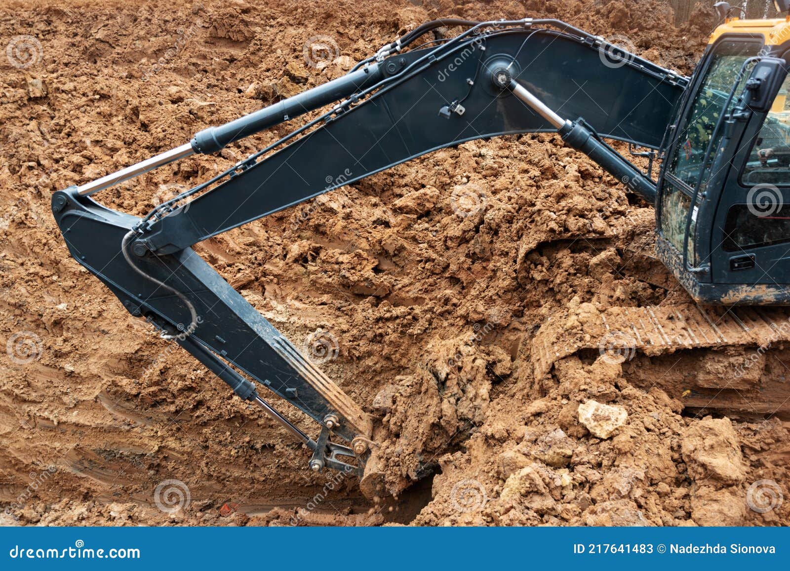 Three Excavators in the Process of Work Digs Stock Image - Image of ...