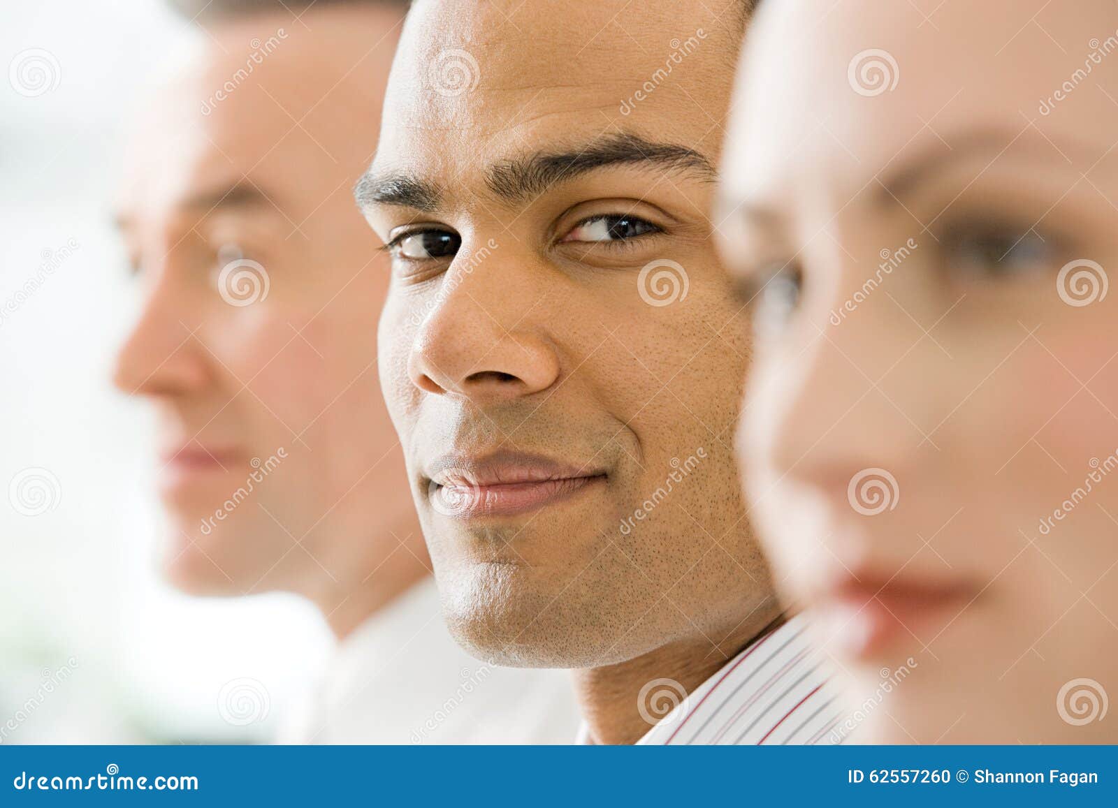 Three faces in a row stock photo. Image of meeting, macho - 62557260