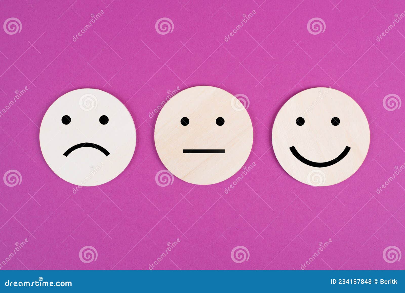 Three Faces, Smiling, Sad in Different Colors on a Pink Background ...