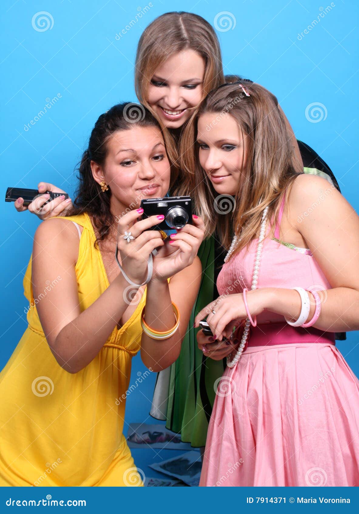 Three Female Friends with a Camera Stock Image - Image of communication ...
