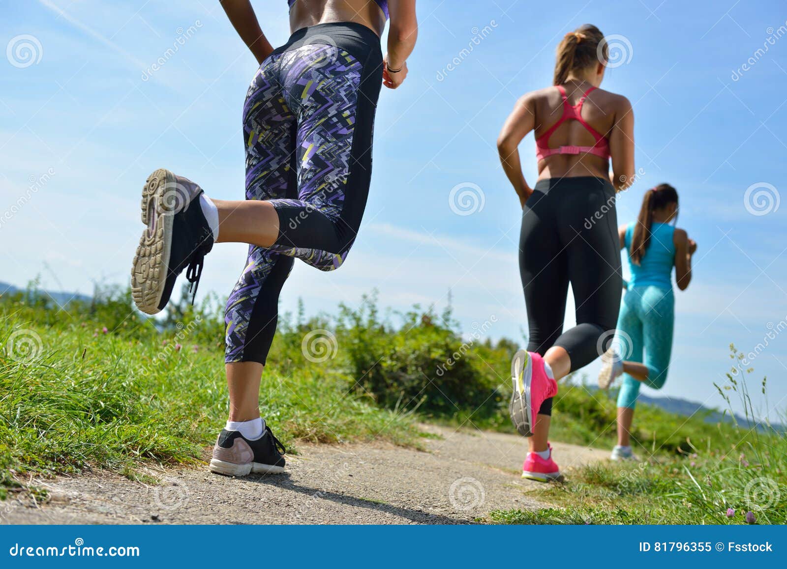 Three Female Joggers Running Together Outdoors Stock Image - Image of ...