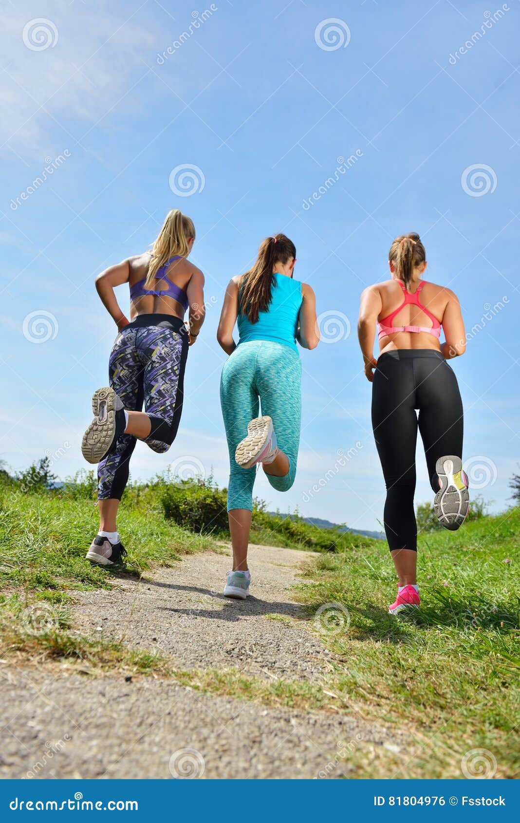 Three Female Joggers Running Together Outdoors Stock Photo - Image of ...