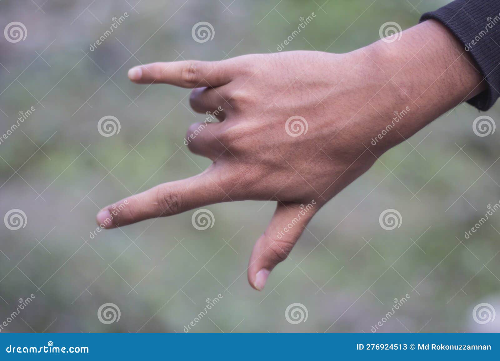 Three Fingers in One Hand are Open and the Rest are Wrapped Stock Image ...