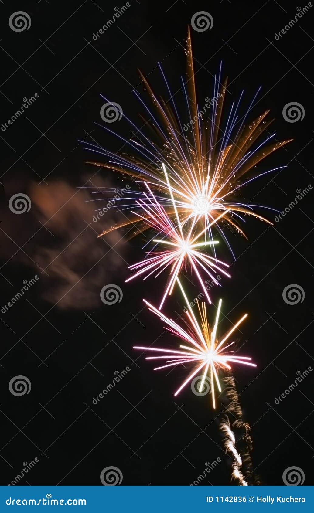 Three Firework Bursts stock photo. Image of colourful - 1142836