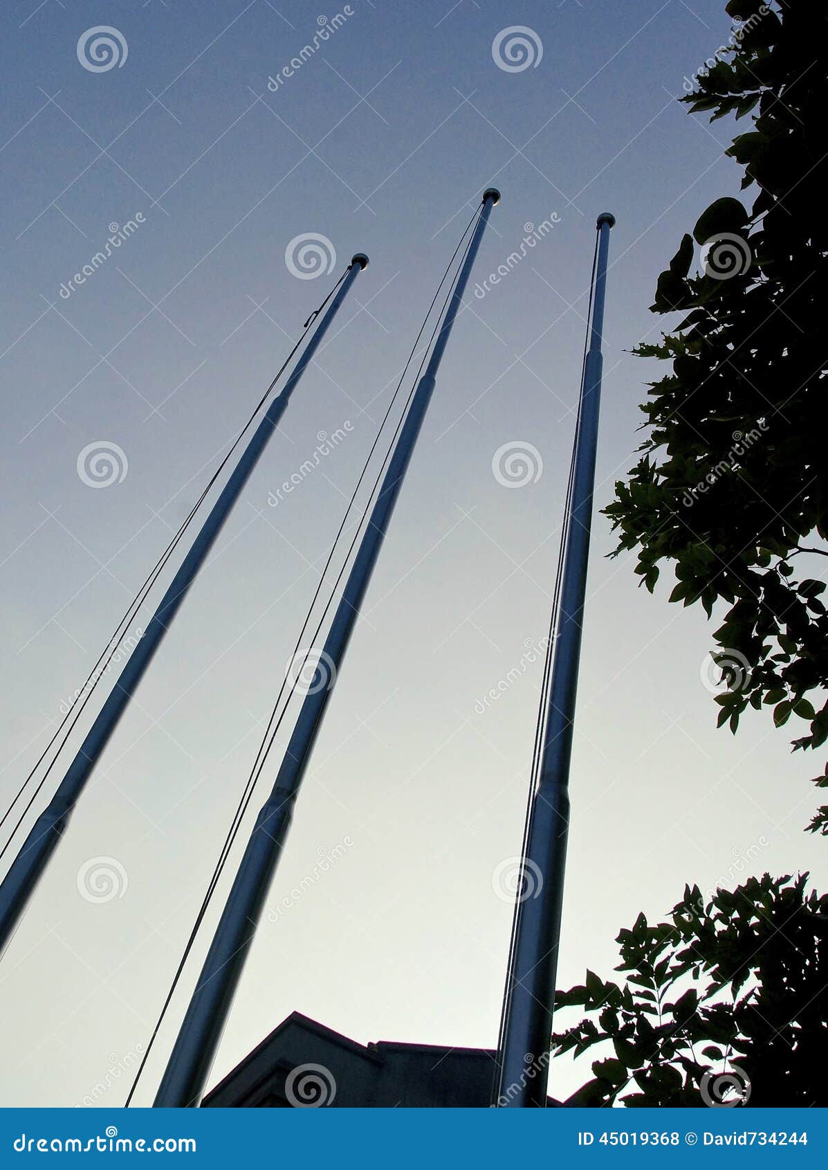 Three flag pole at school stock photo. Image of celebration - 45019368