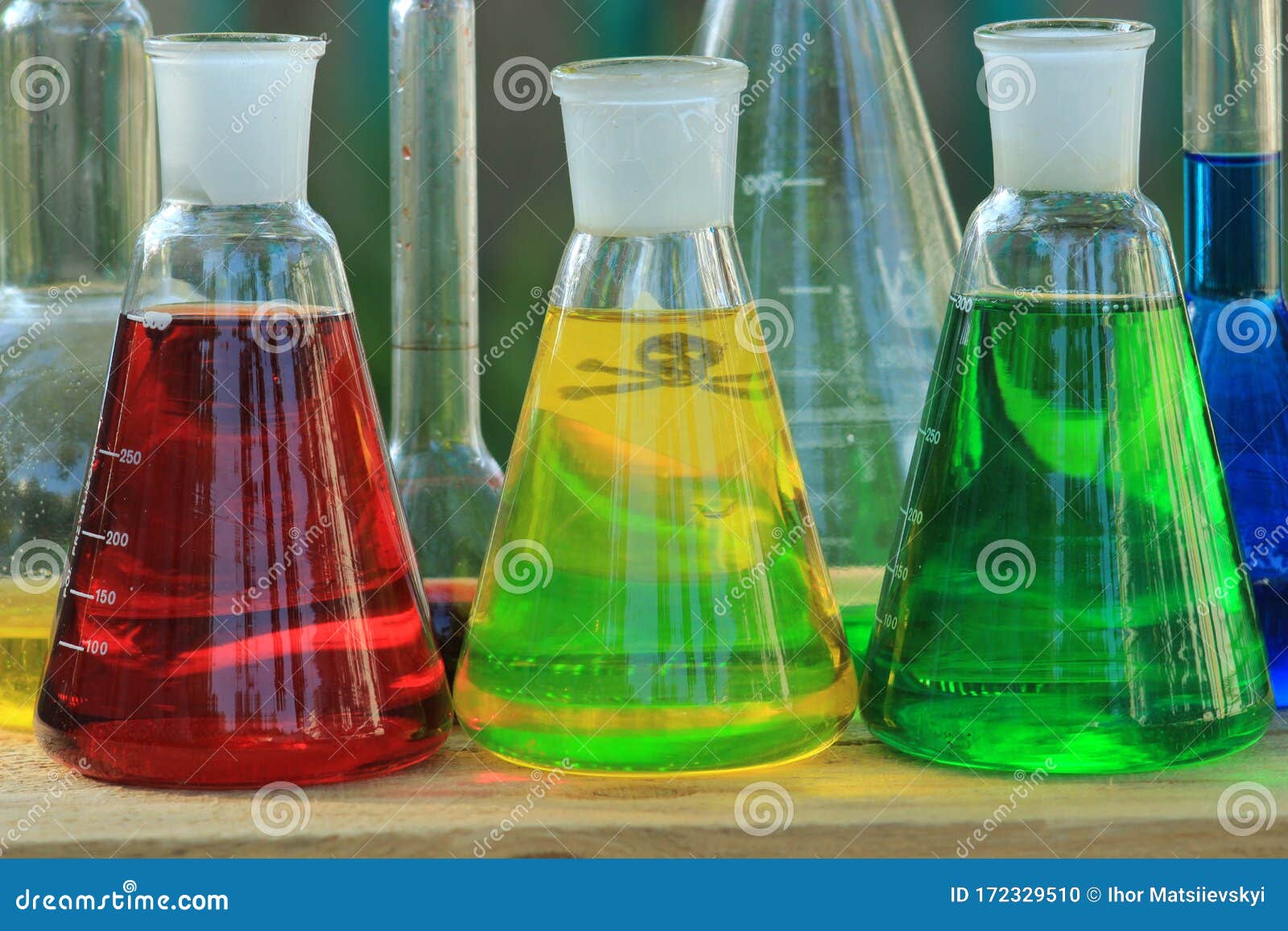 Three Flasks with Colored Liquid Reagents. Stock Photo - Image of blue ...