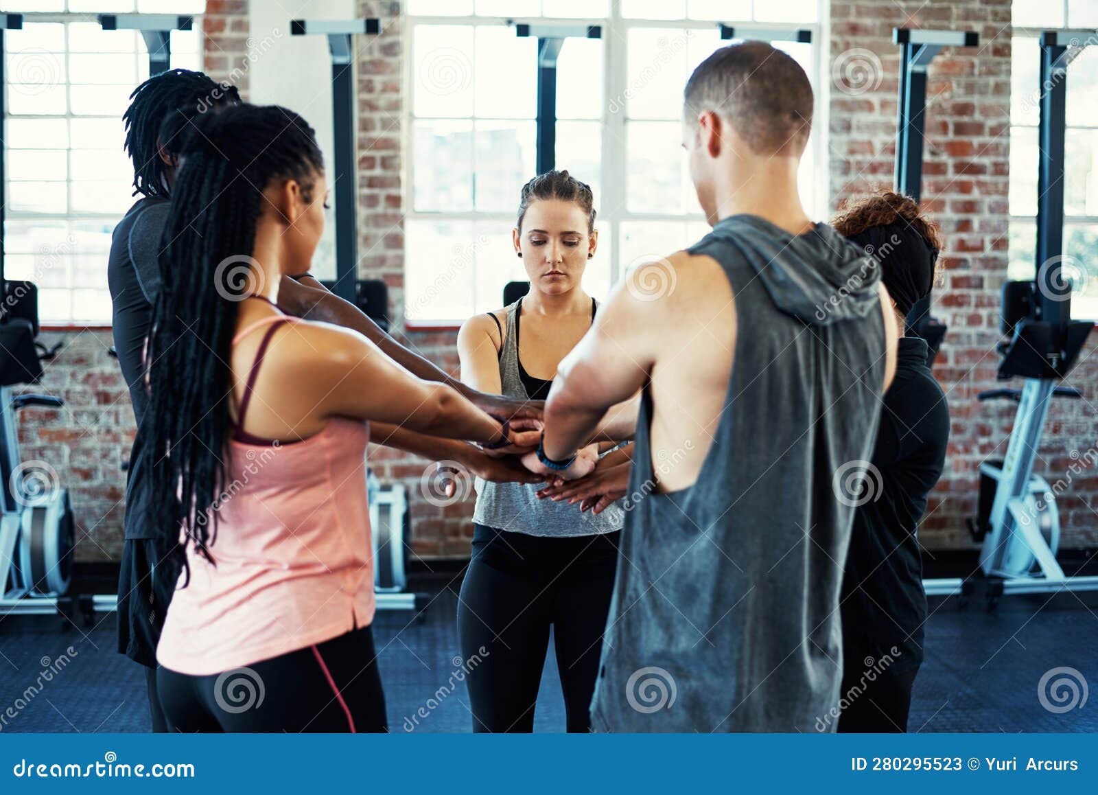On Three. a Focused Young Group of People Forming a Huddle Together ...