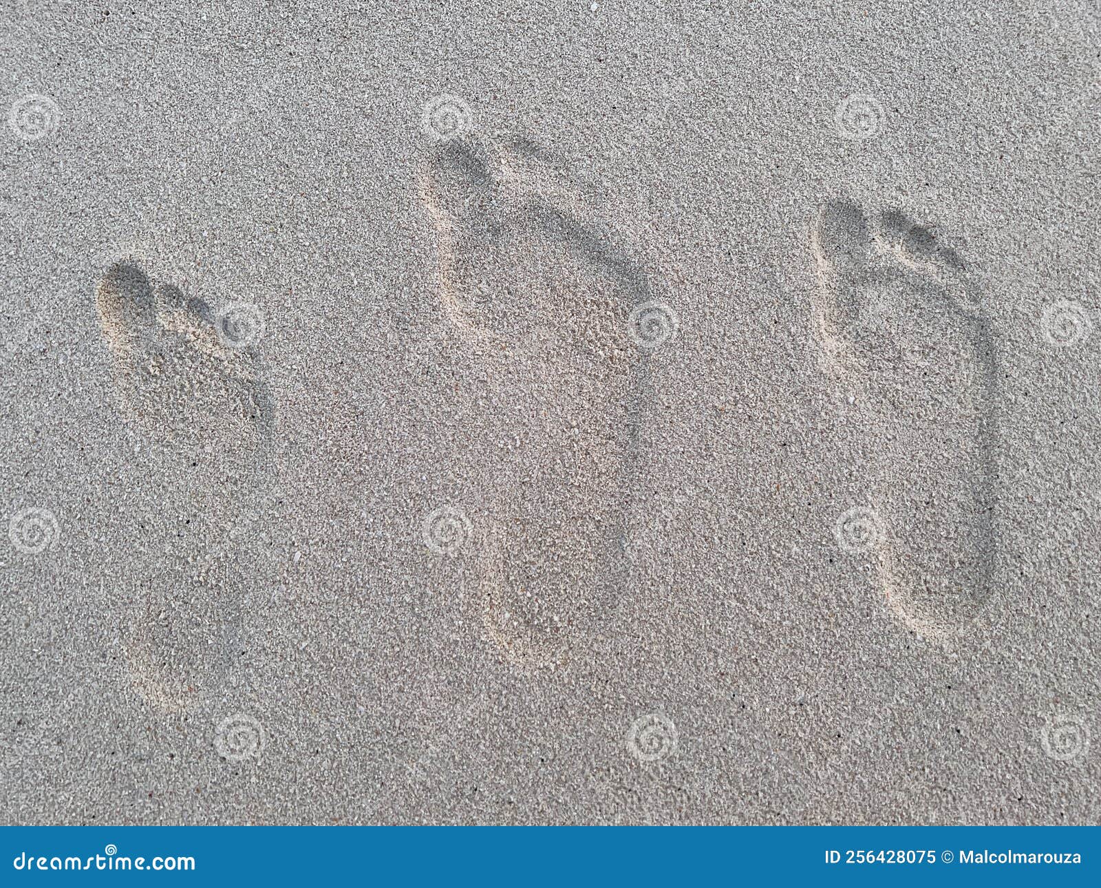 Three Footprints on the Sand Stock Image - Image of texture, barefoot ...