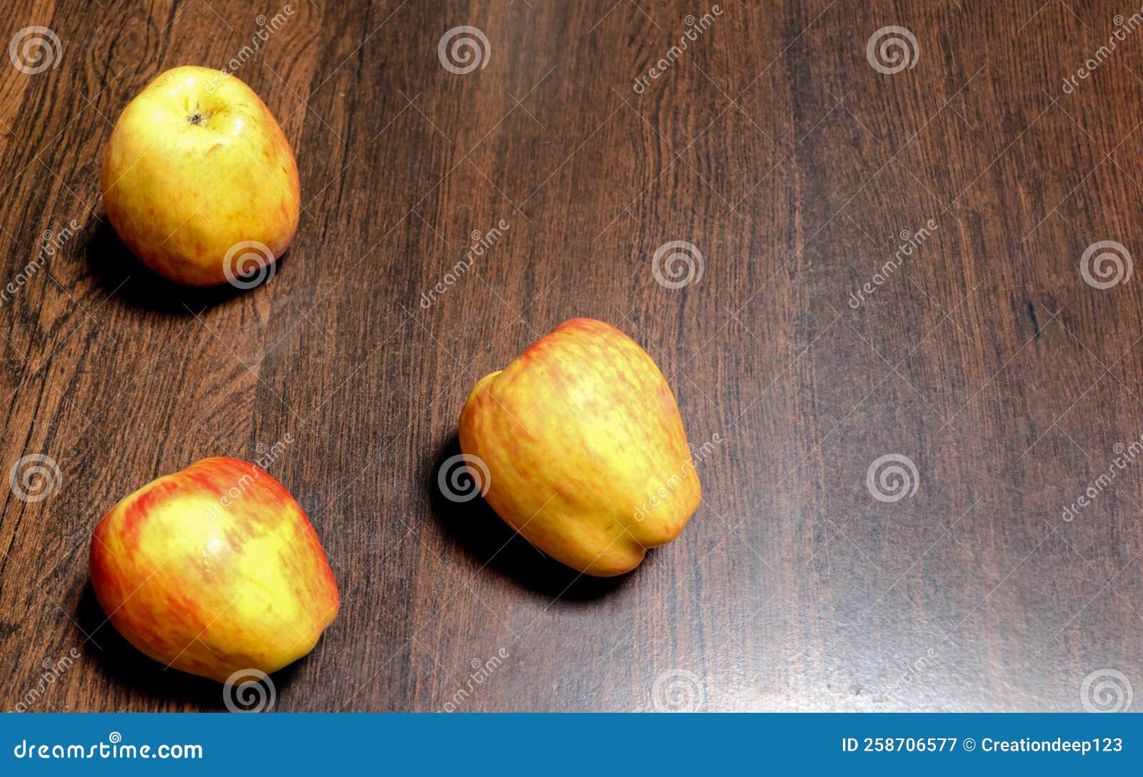 Three Fresh Apples Difference Colors on Wood Table Stock Image - Image ...