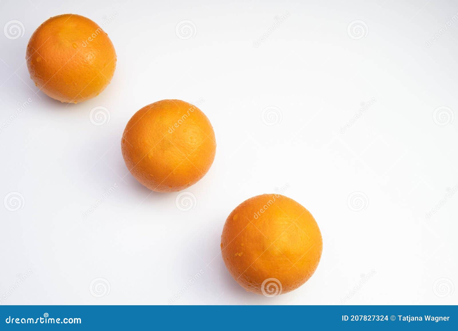 Three Fresh Oranges are Laid Out in a Row on a Table Stock Photo ...