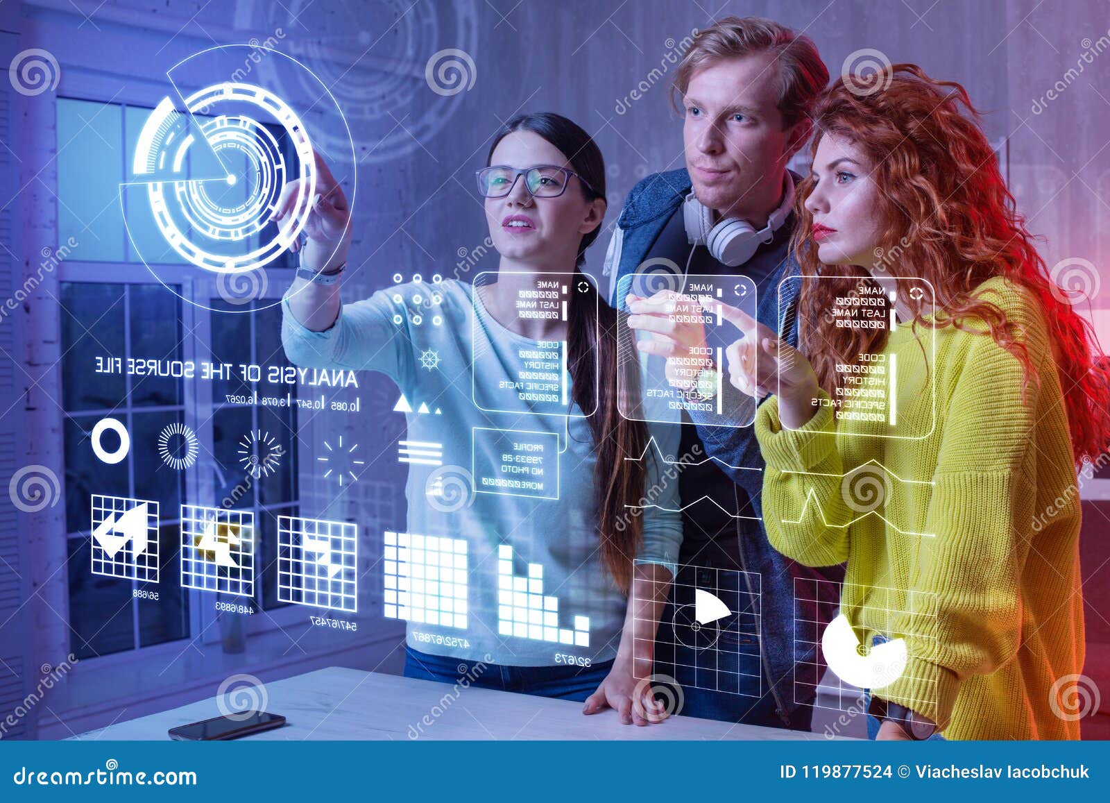 Three Friendly People Looking at the Screen and Thinking Stock Photo ...