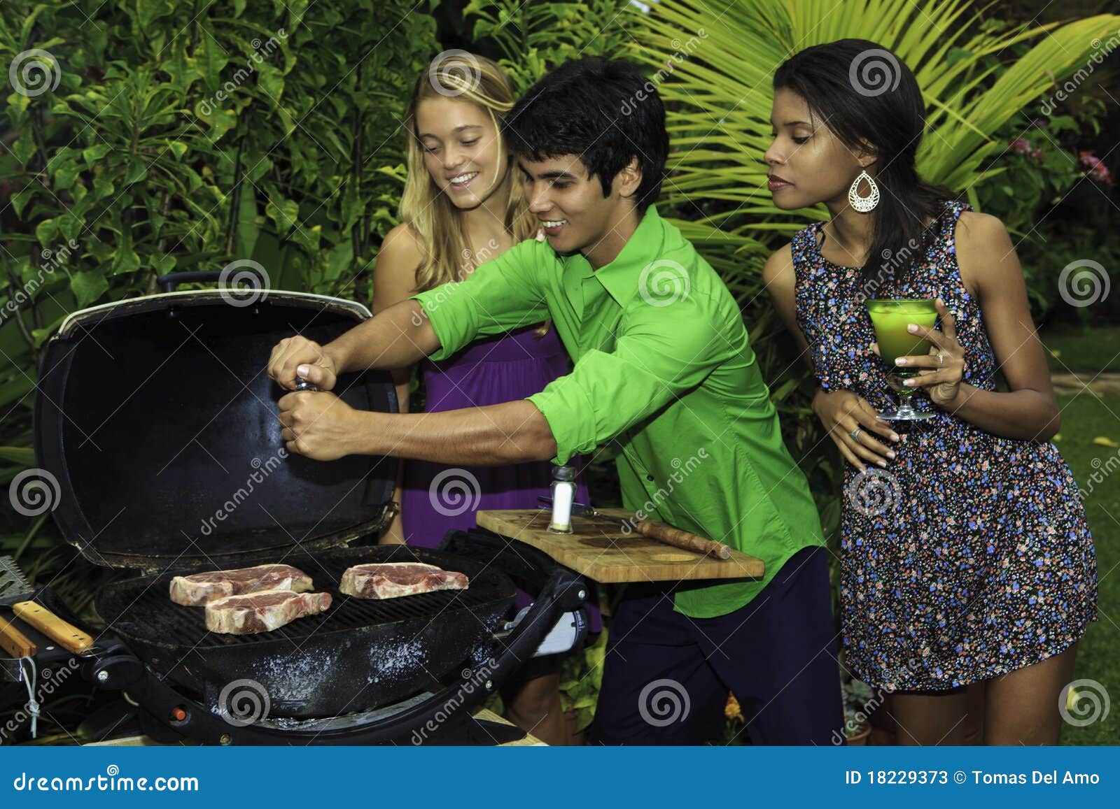 Three Friends at a Barbecue Stock Image - Image of lunch, outdoors ...