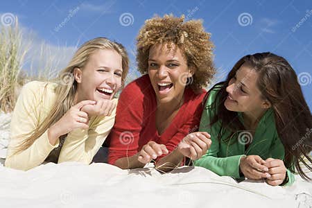 Three Friends Having Fun at Beach Stock Image - Image of clothing ...