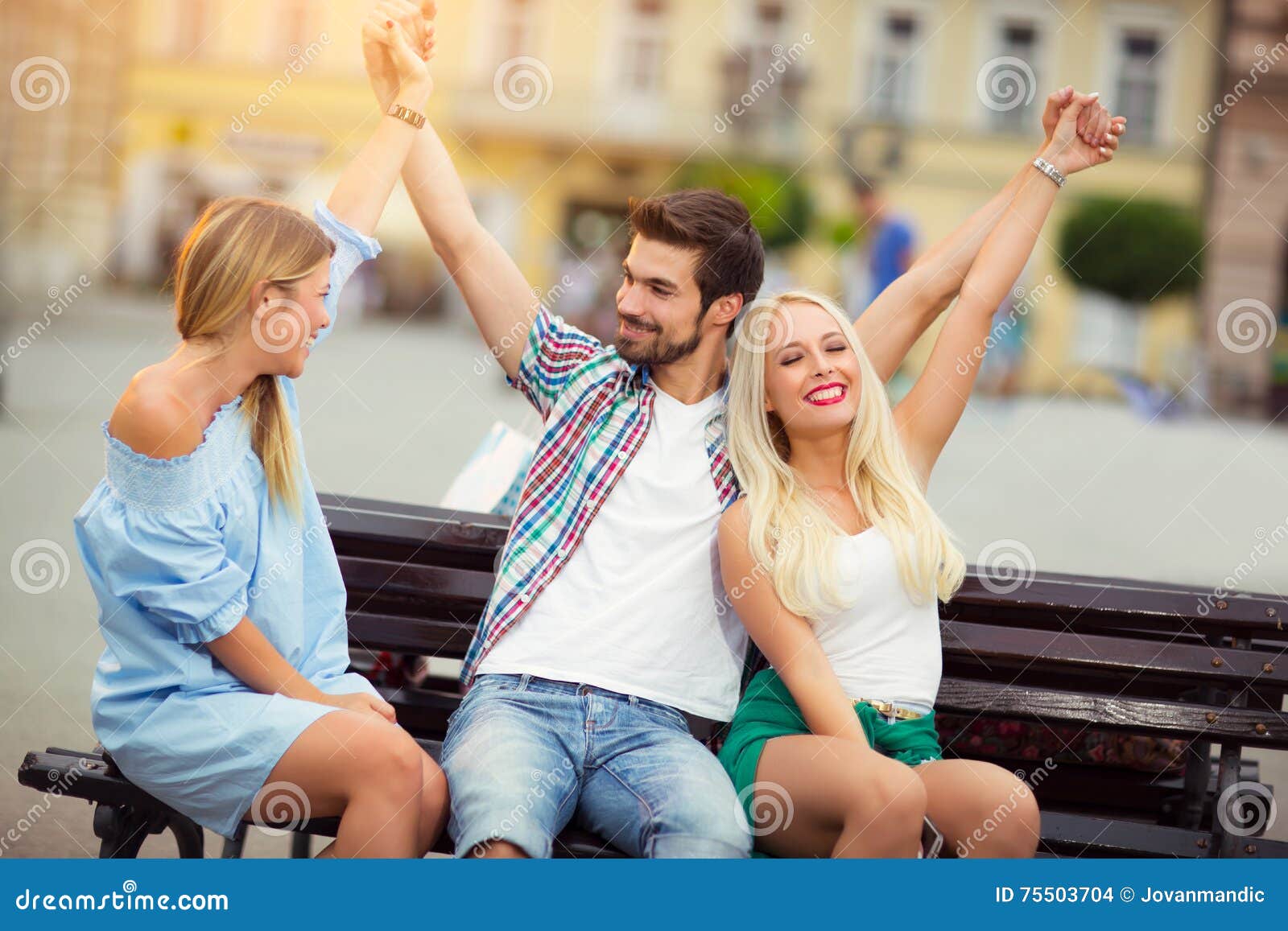 Three Friends Having Fun on the Bench Stock Photo - Image of friendly ...