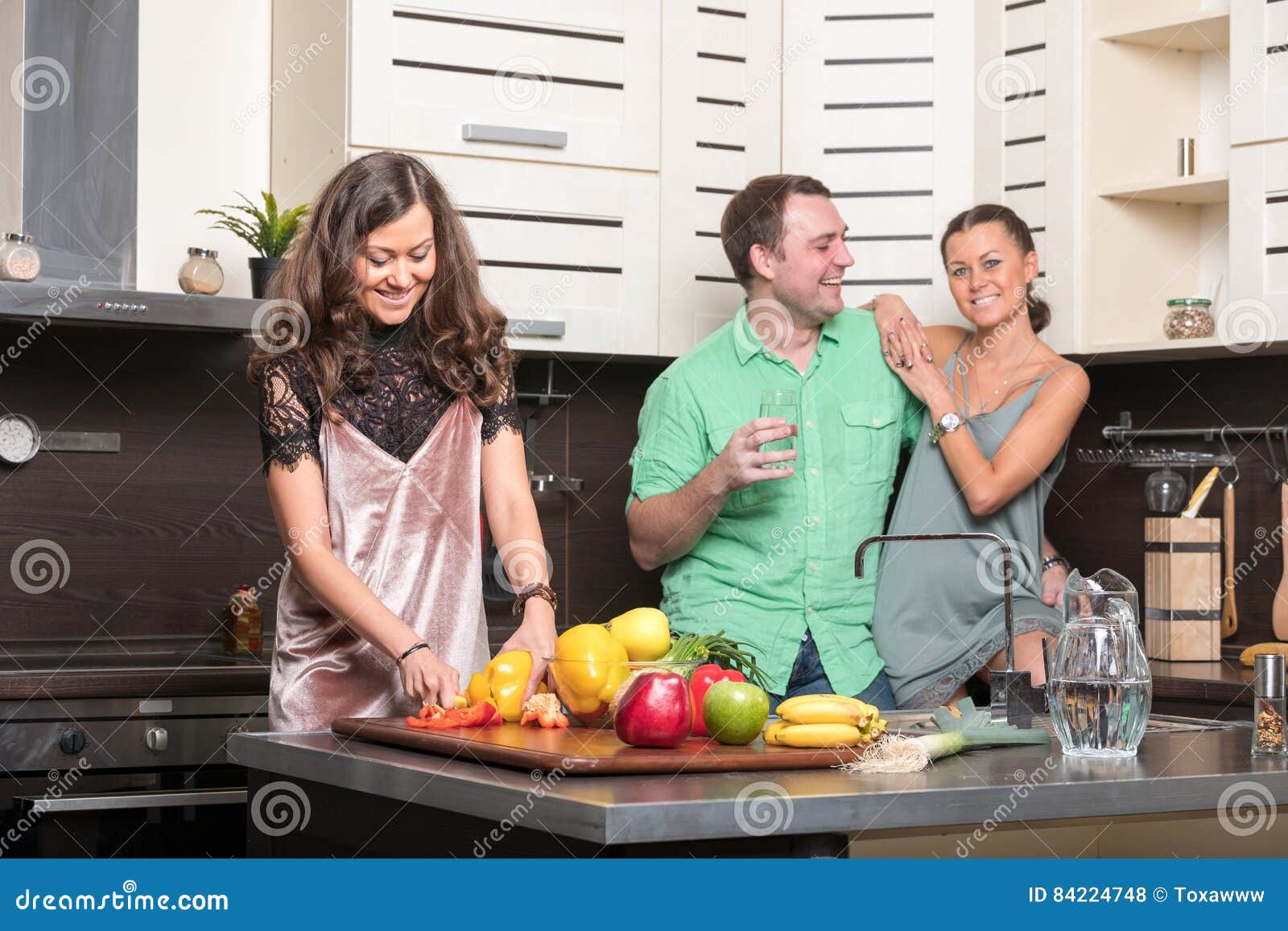 Three Friends Having Fun in the Kitchen Stock Photo - Image of ...