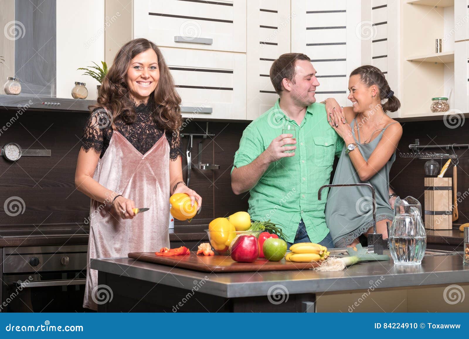 Three Friends Having Fun in the Kitchen Stock Photo - Image of ...