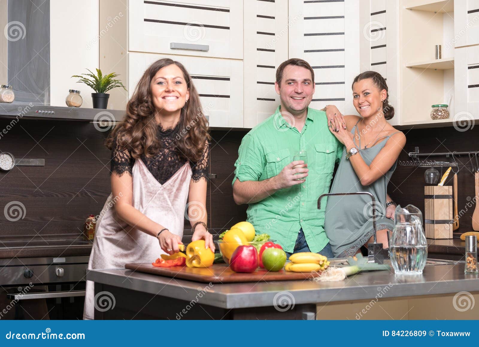 Three Friends Having Fun in the Kitchen Stock Image - Image of domestic ...