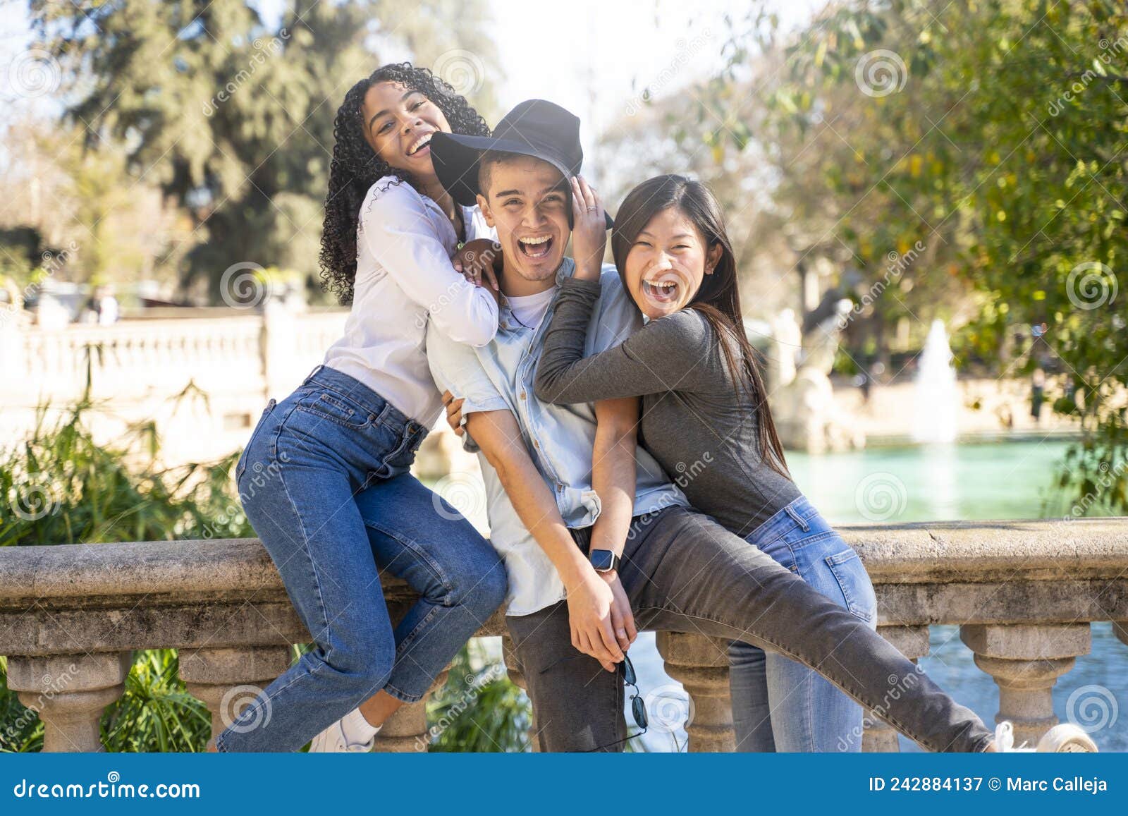 Three Friends Having Fun Visiting a Landmark and Looking at the Camera ...