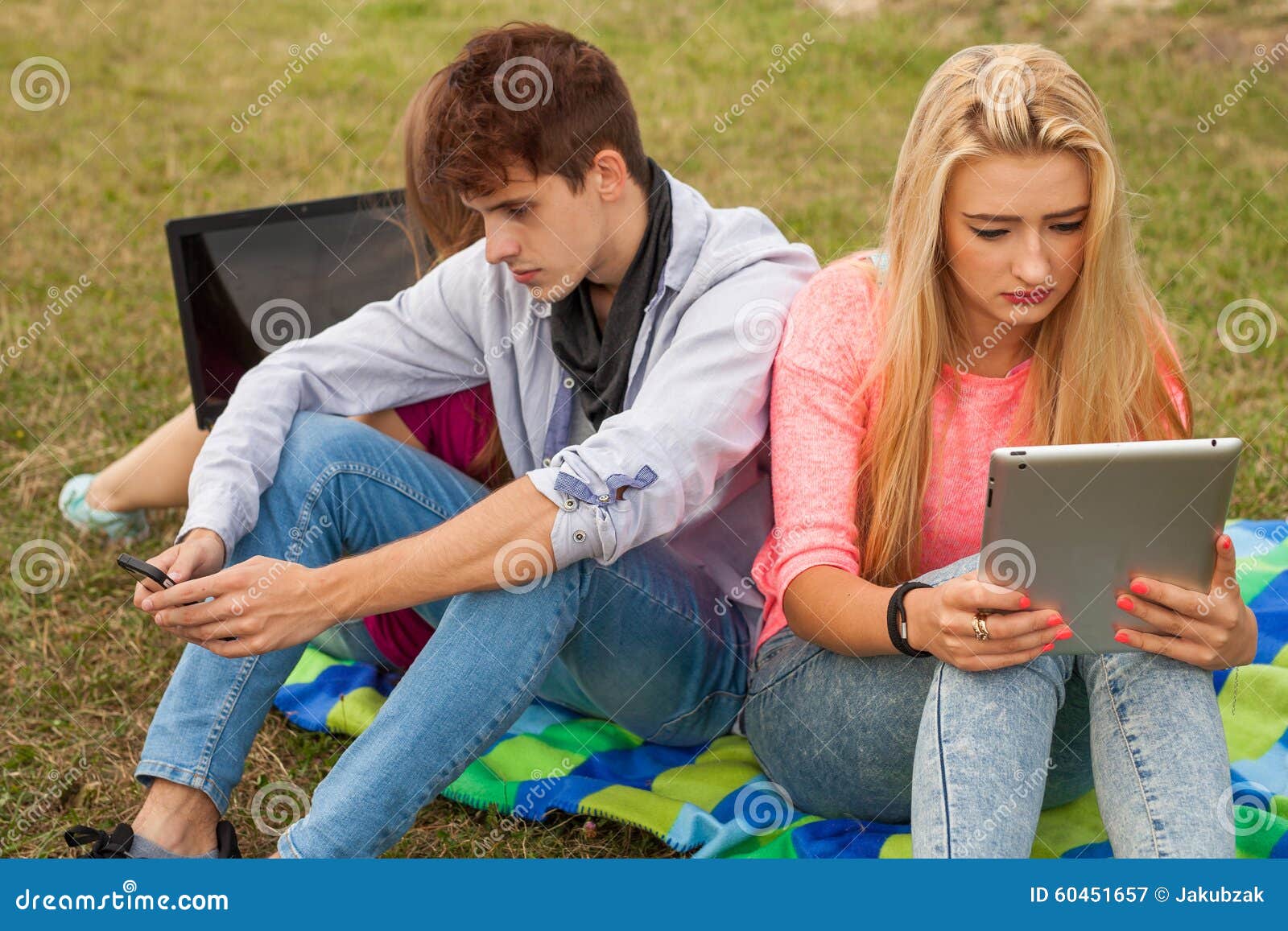 Three Friends Relaxing and Having Fun in Park. Stock Image - Image of ...