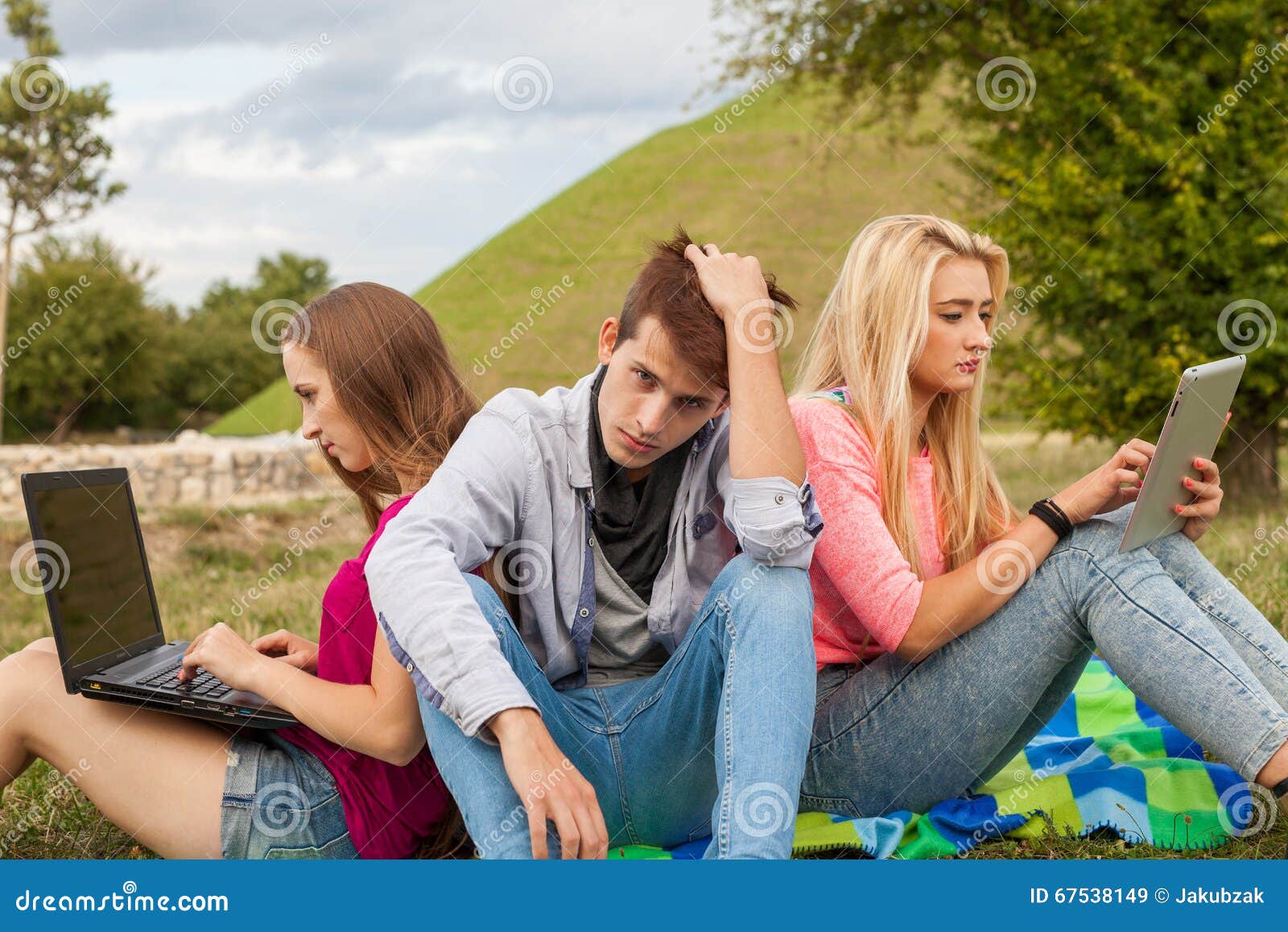 Three Friends Relaxing and Having Fun in Park. Stock Image - Image of ...