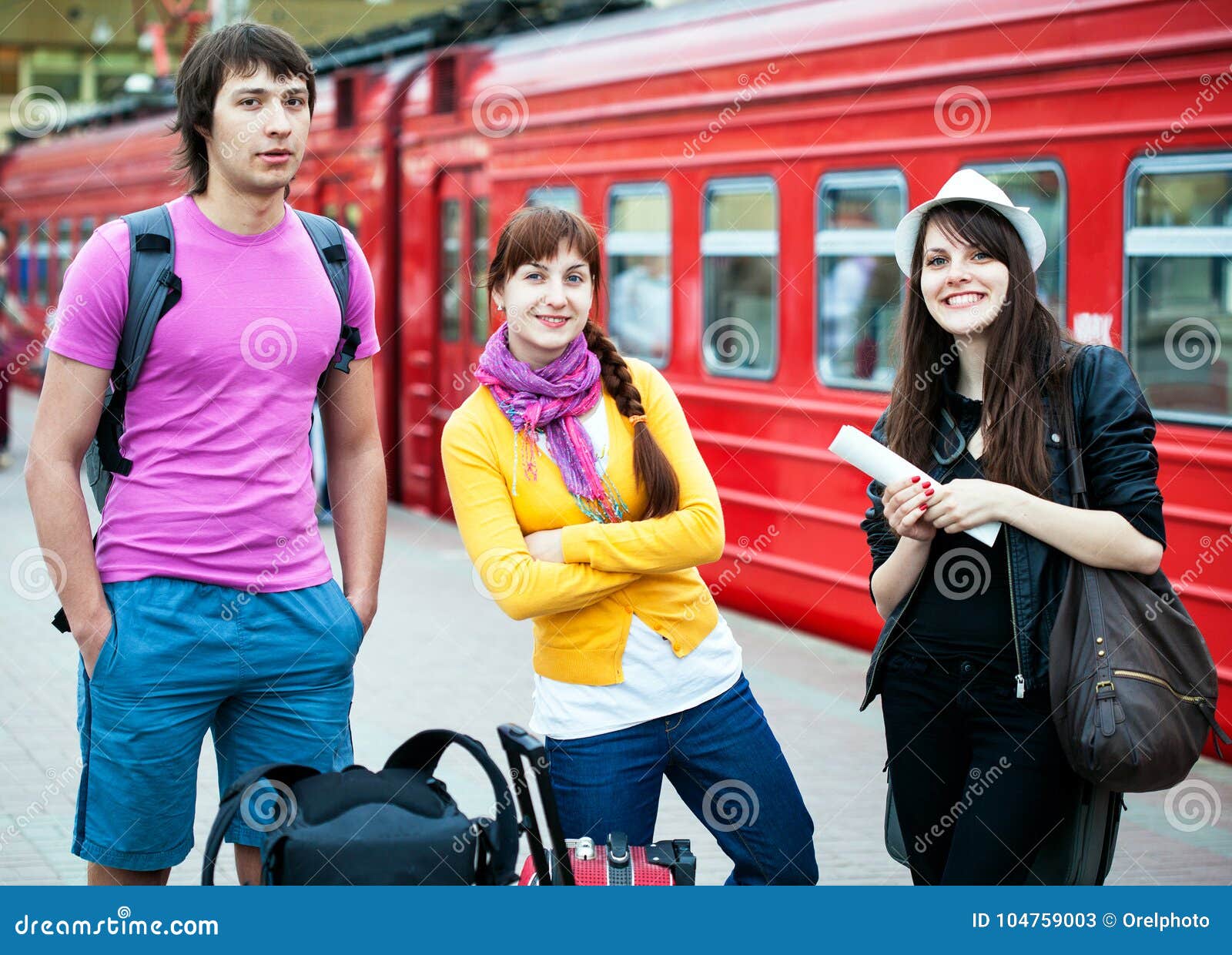 Three Friends Waiting for a Train at the Station Stock Image - Image of ...