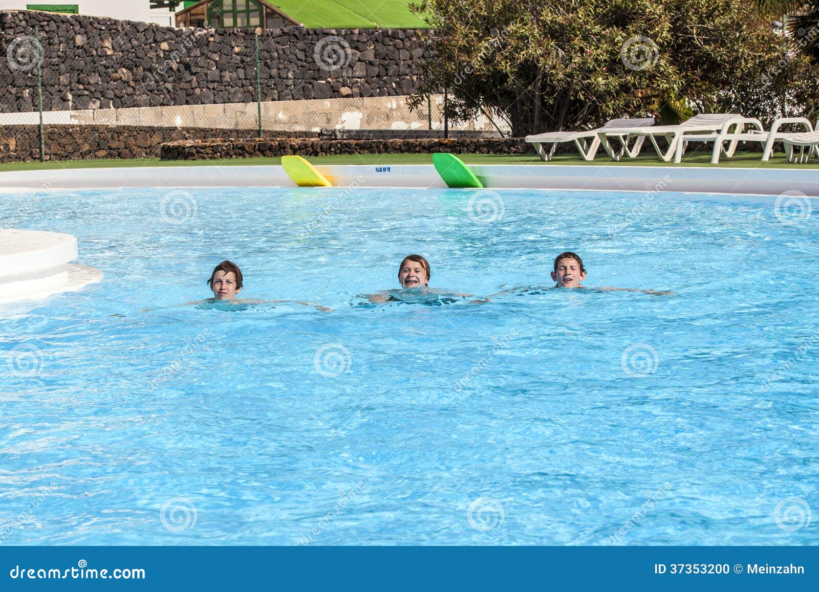 Three Friends Swimming in a Row Stock Photo - Image of caucasian ...