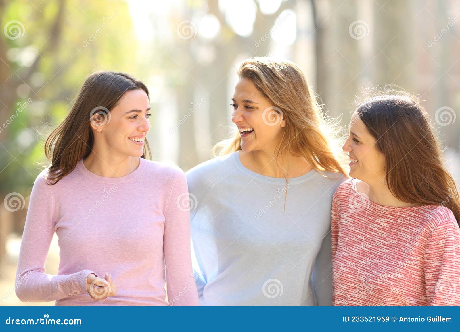Three Friends Talking Walking in the Street Stock Image - Image of ...