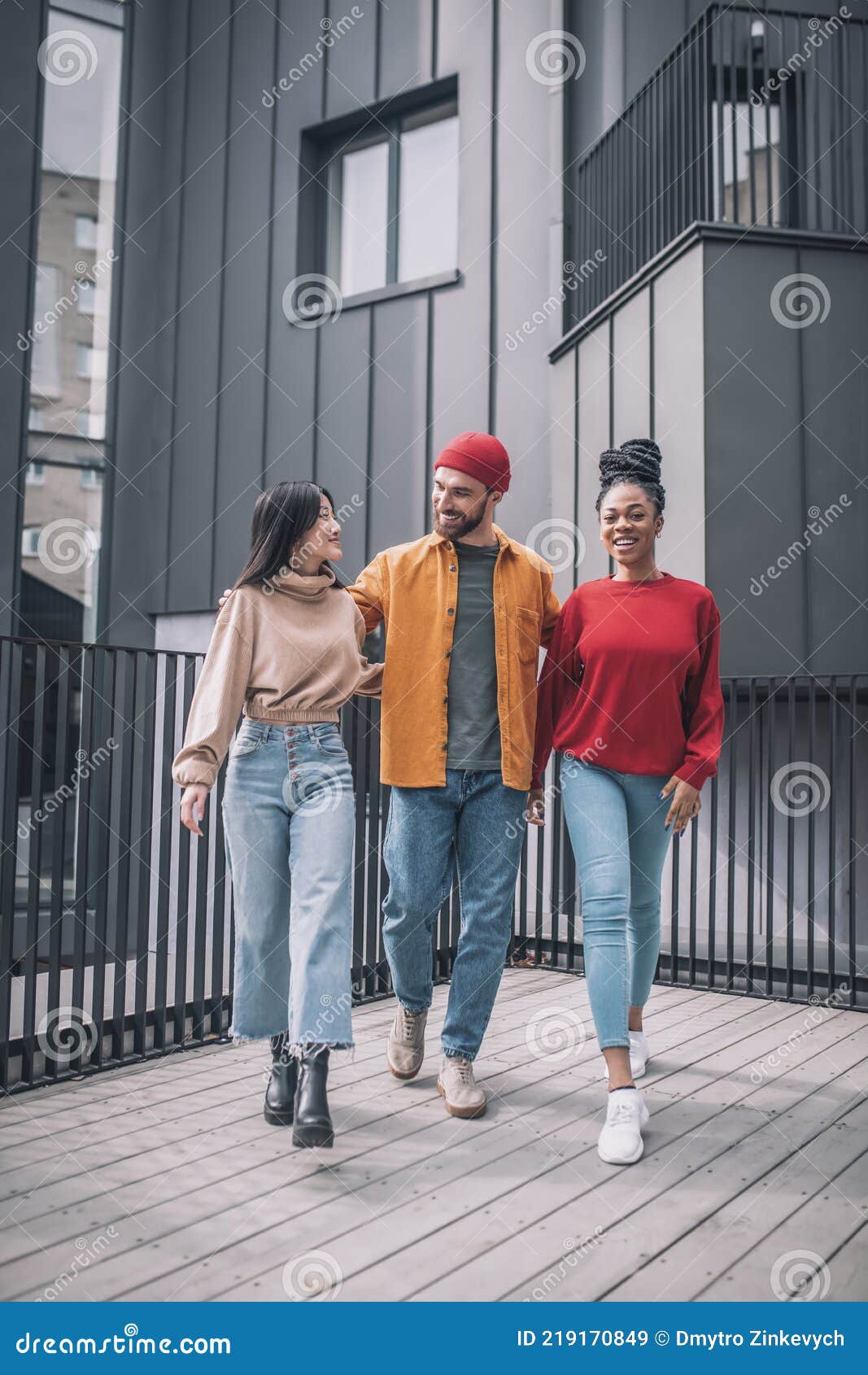 Three Friends Walking Together and Feeling Good Stock Image - Image of ...