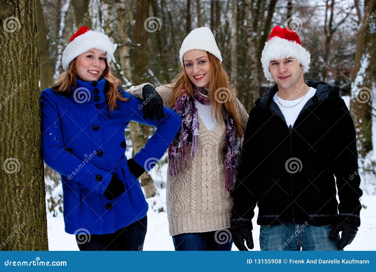 Three Friends in Winter Time Stock Photo - Image of contact, outdoors ...