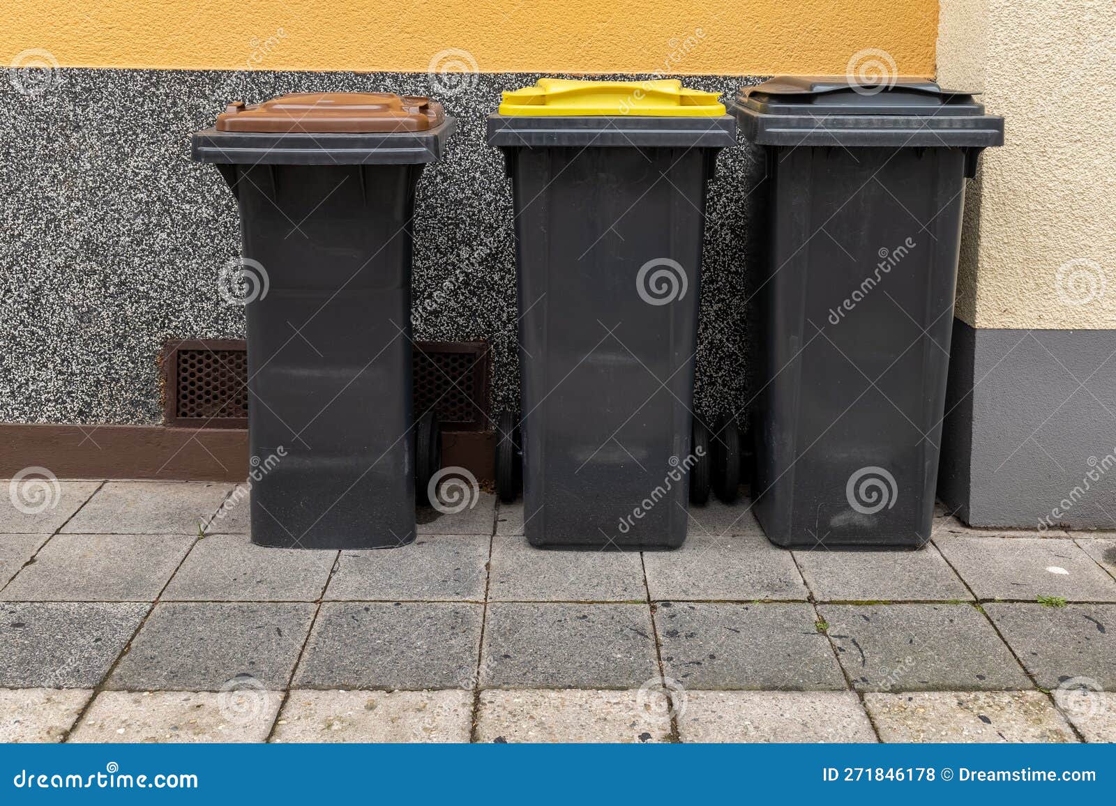 Three Garbage Cans in Front of a House Stock Photo - Image of urban ...