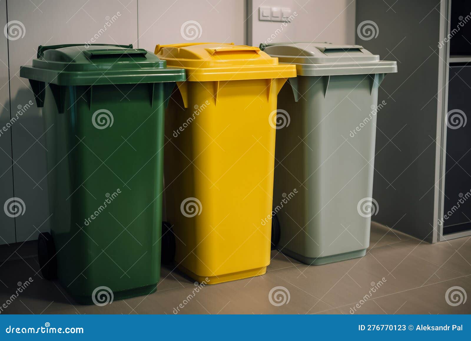 Three Garbage Containers in Yellow, Green and White, for Various Types ...