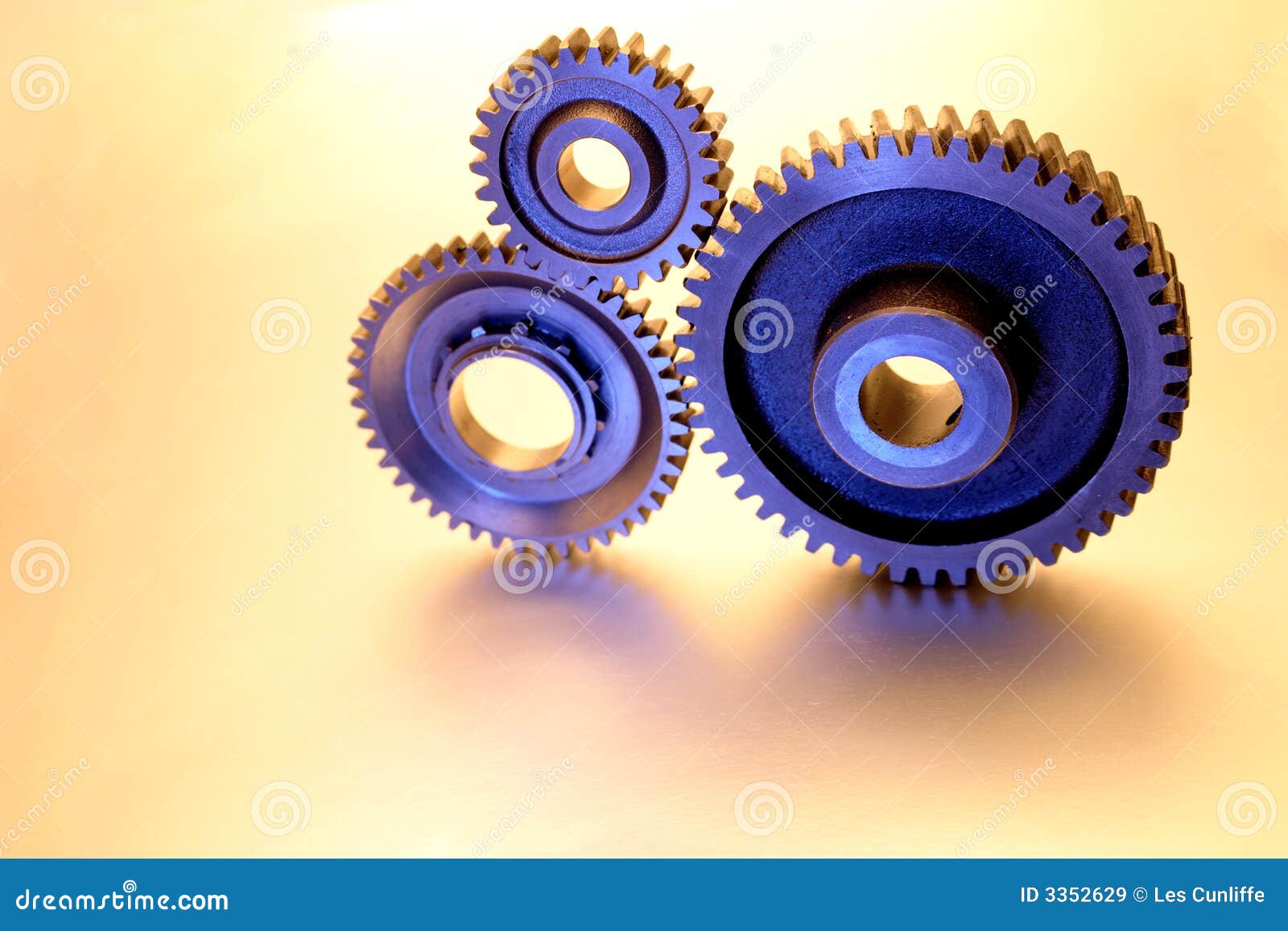 Three gears stock image. Image of machine, mesh, engaged - 3352629
