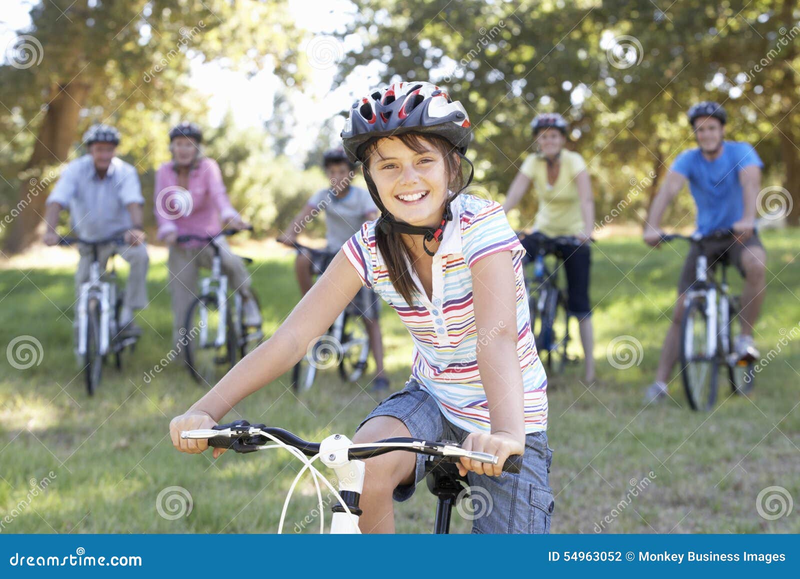 Three Generation Family on Cycle Ride in Countryside Stock Photo ...