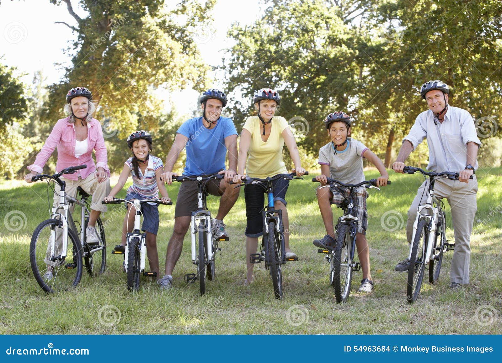 Three Generation Family on Cycle Ride in Countryside Stock Photo ...