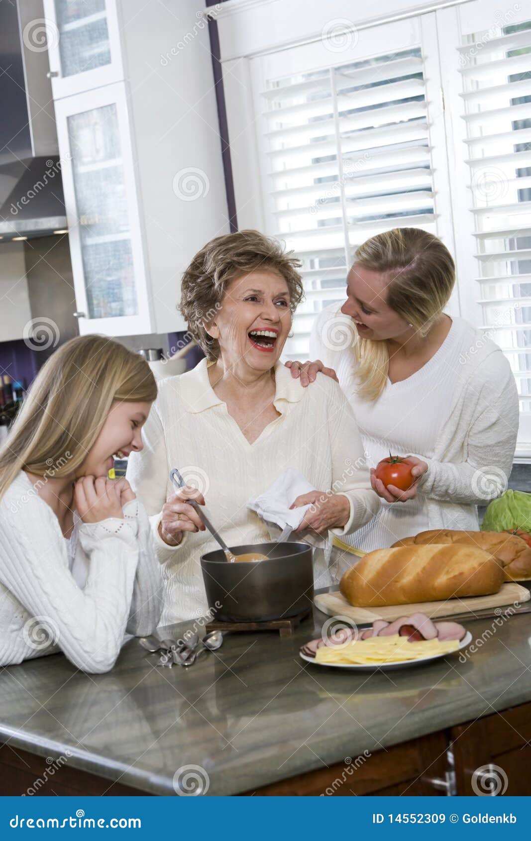 Three Generation Family in Kitchen Cooking Lunch Stock Image - Image of ...