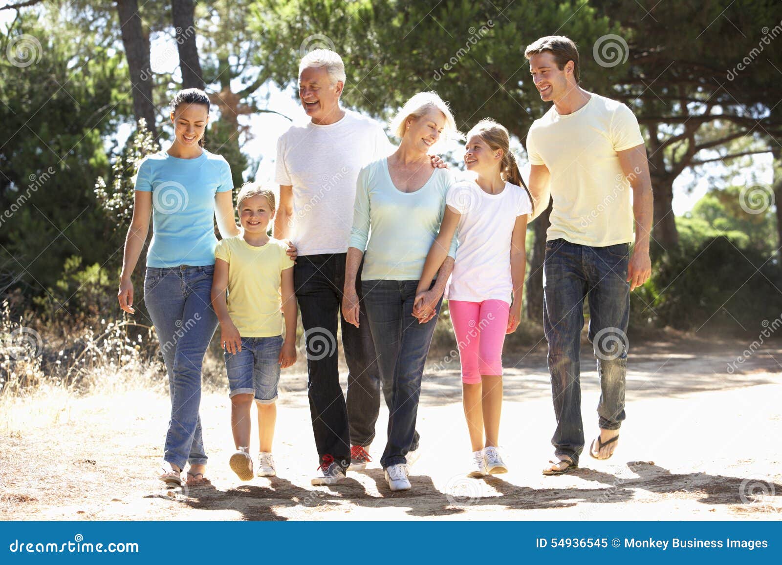 Three Generation Family on Summer Countryside Walk Together Stock Image ...