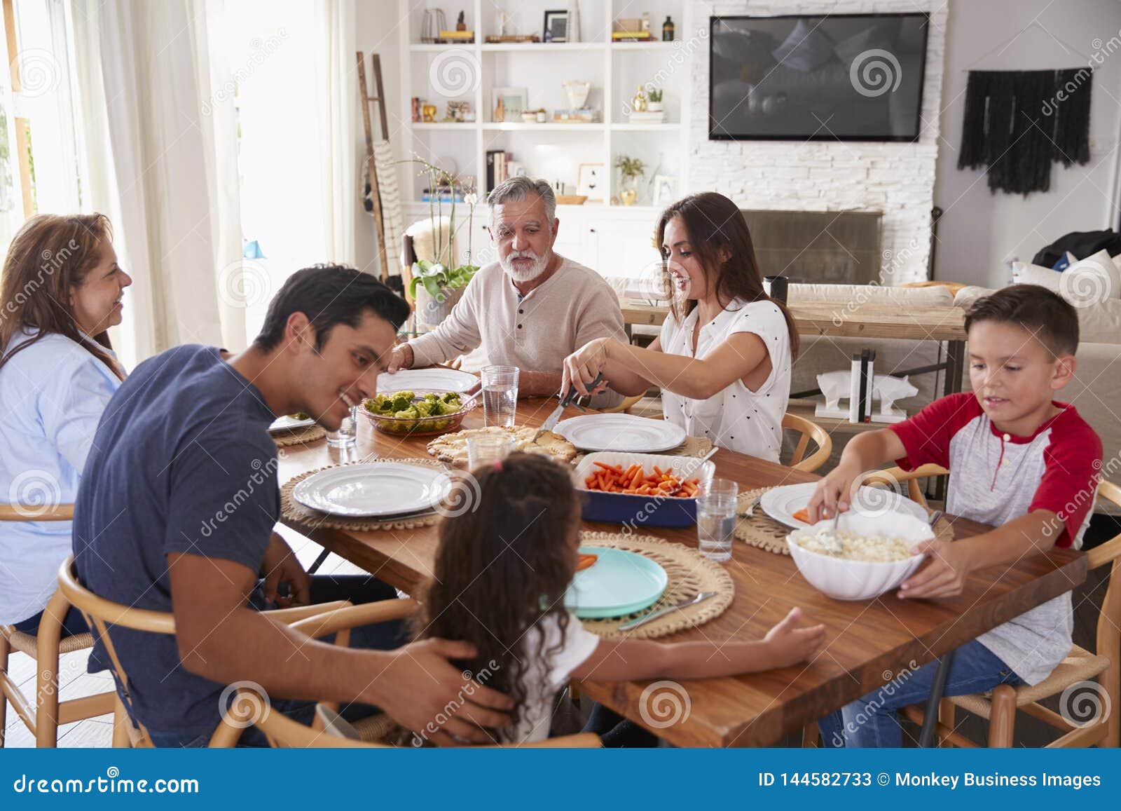 Happy Hispanic Family Dinner