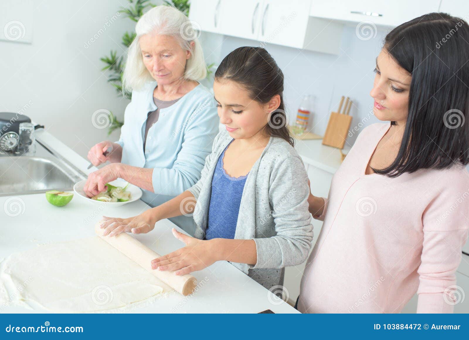 Three Generations Family Enjoyed Cooking in Kitchen Stock Photo - Image ...