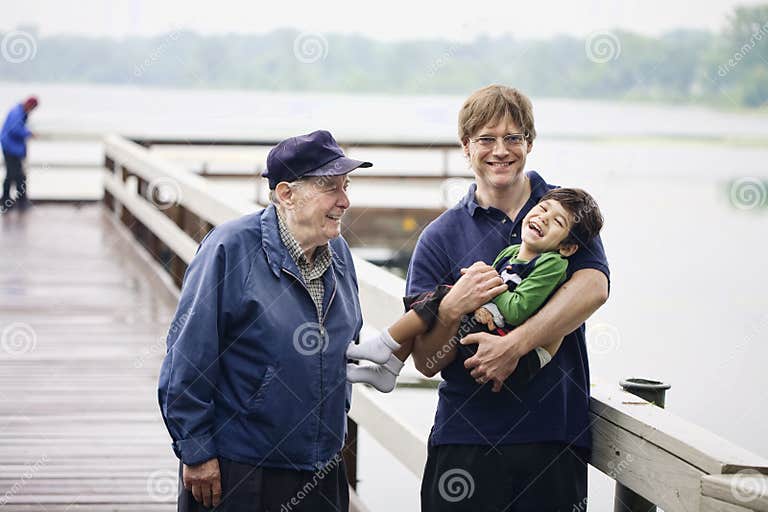 Three generations together stock image. Image of blue - 14776955